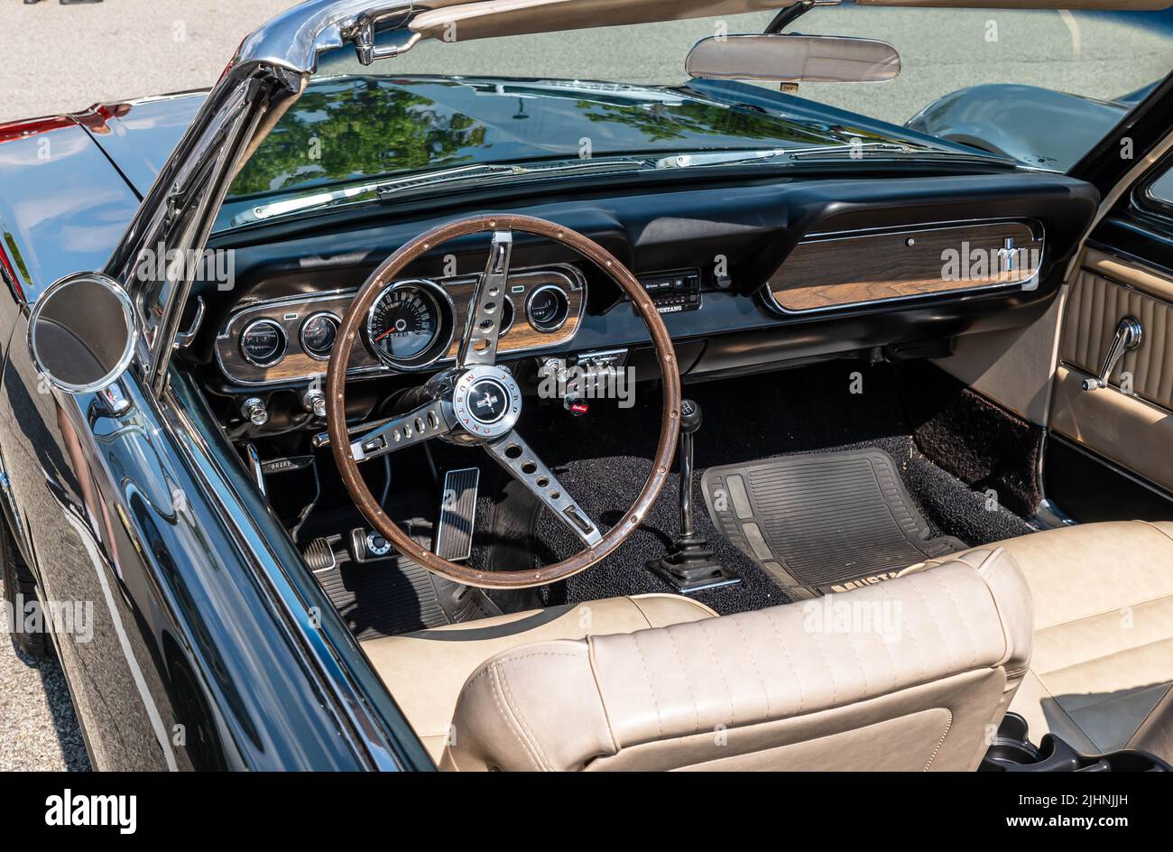 The steering wheel and dashboard of a Ford Mustang convertible at the ...