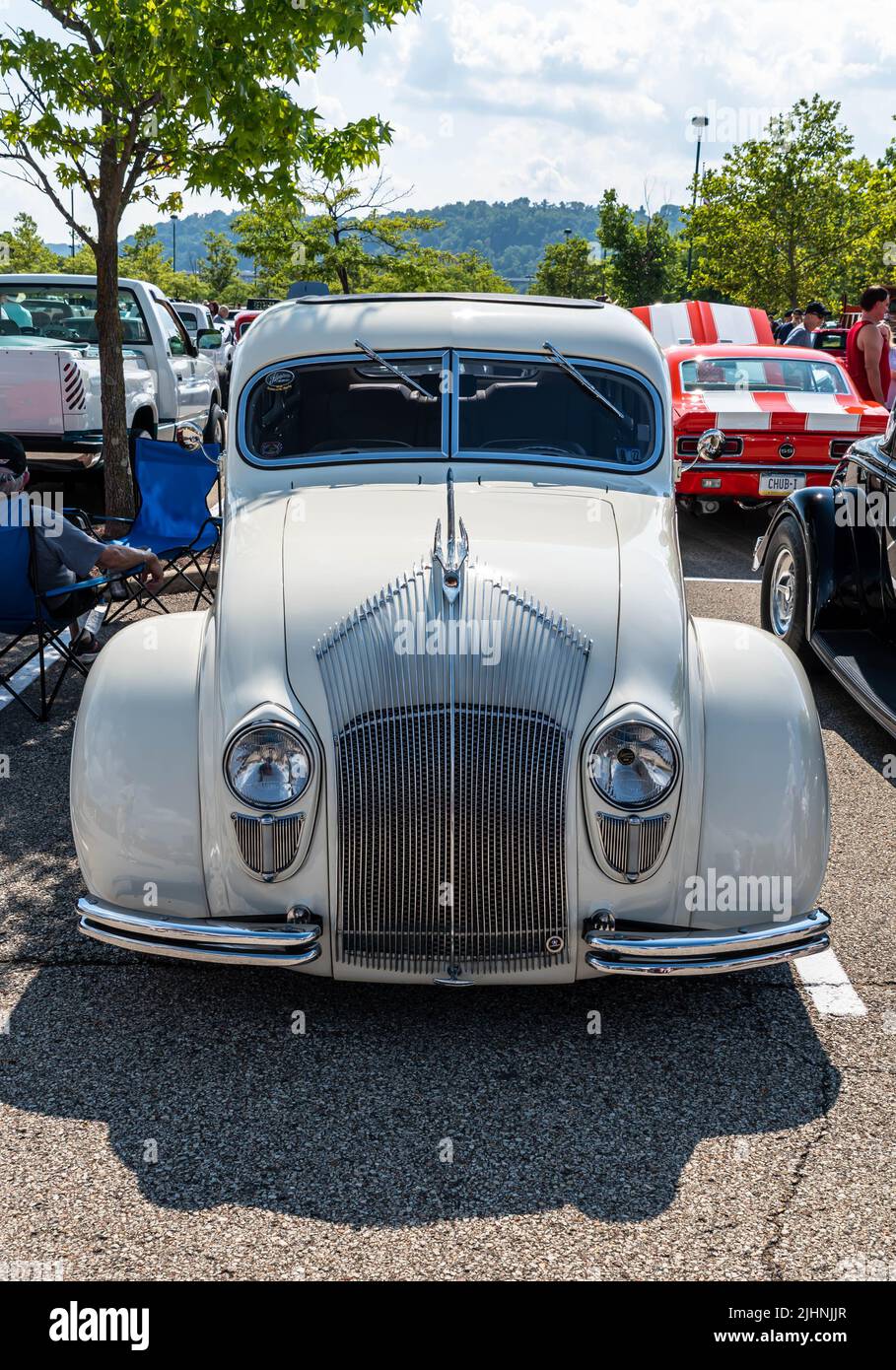 An old white Chrysler sedan at the Homestead Waterfront car show in ...