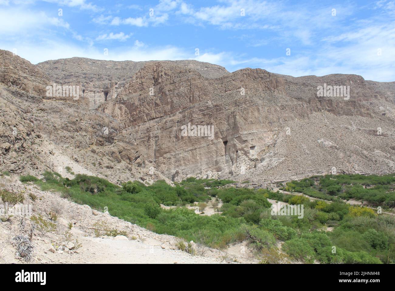 Cliffs with blue sky and interesting clouds at Big Bend National Park ...