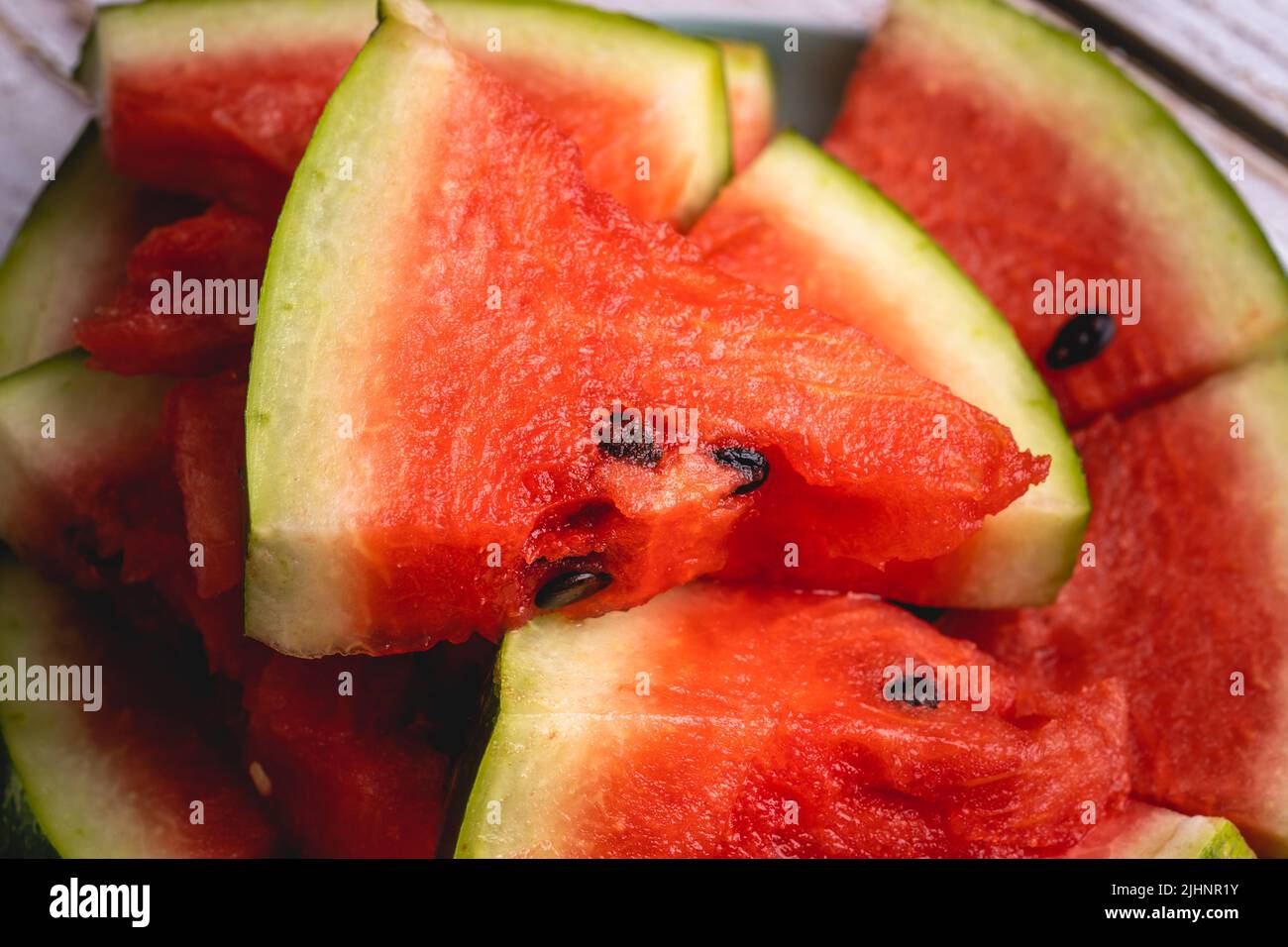 watermelon full frame macro on fresh ripe juicy slices background Stock ...