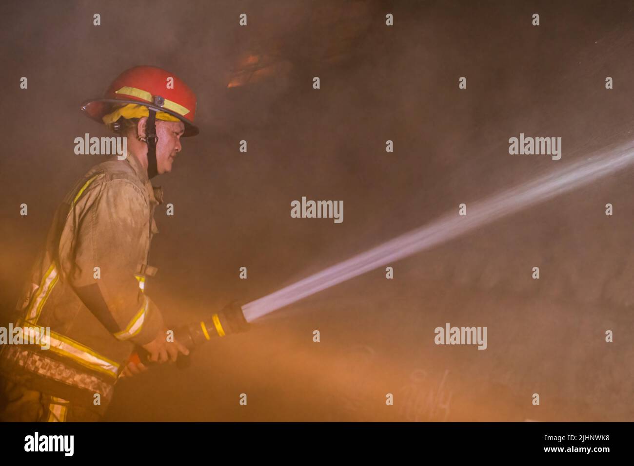 Taytay, Philippines. 20th July, 2022. Volunteer Firefighters try to ...