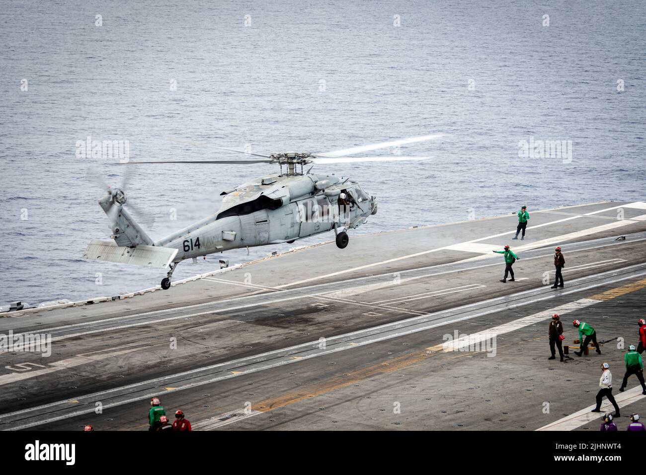 220717-N-WI365-1267 SOUTH CHINA SEA (July 17, 2022) An MH-60S Sea Hawk ...