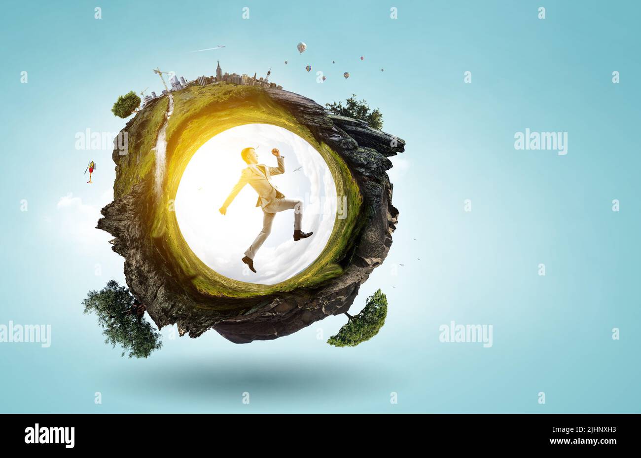 Portrait of energetic businessman jumping in open air Stock Photo - Alamy