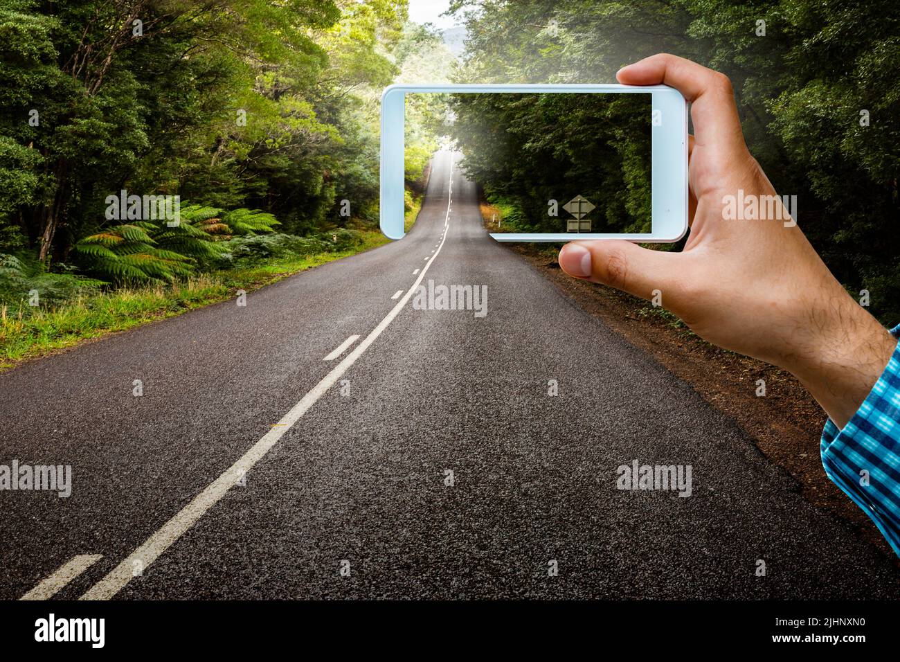 Hand holding smartphone mobile . Mixed media Stock Photo - Alamy