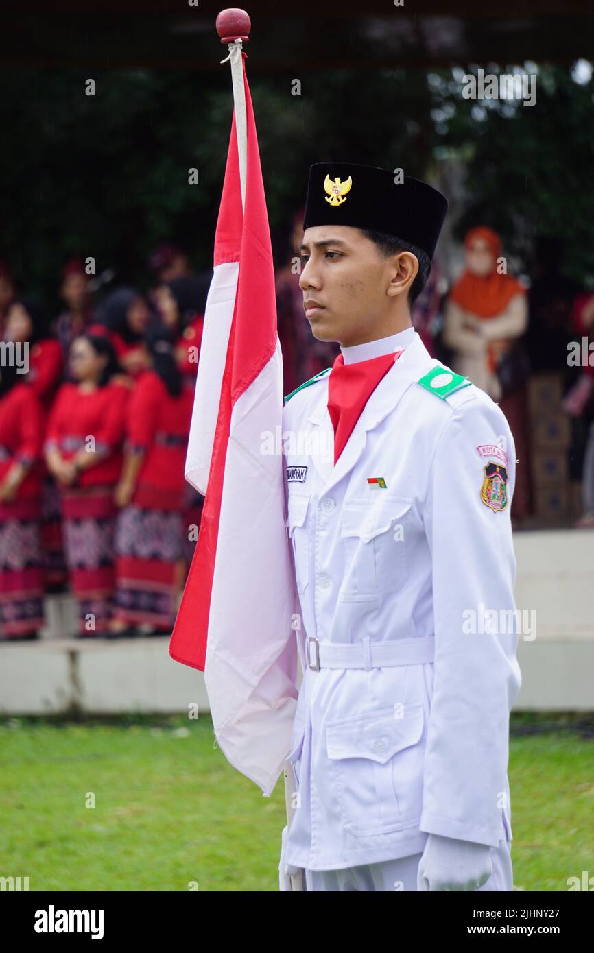 Paskibraka (Indonesian flag raiser) with national flag during grebeg ...