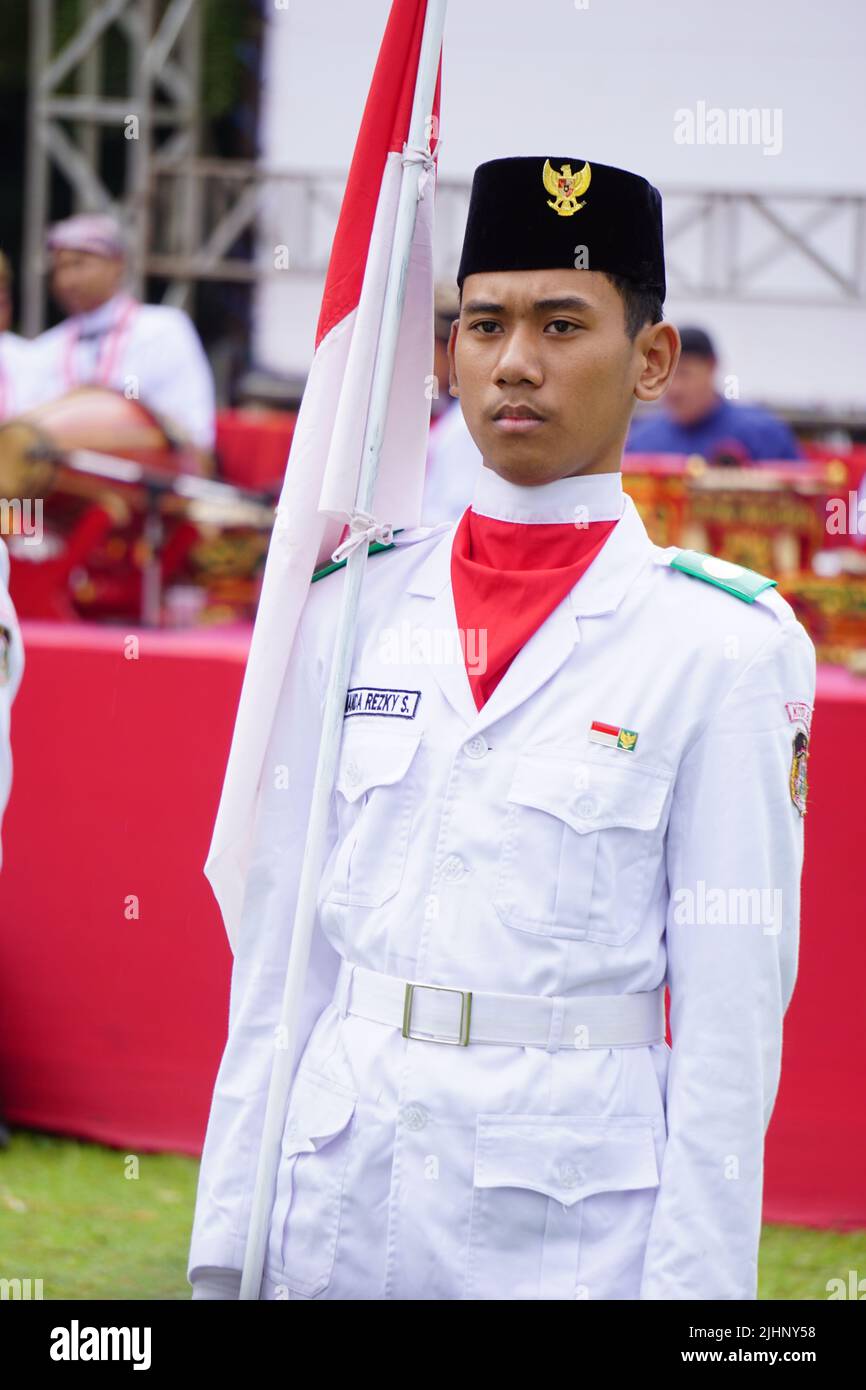 Paskibraka (Indonesian flag raiser) with national flag during grebeg ...