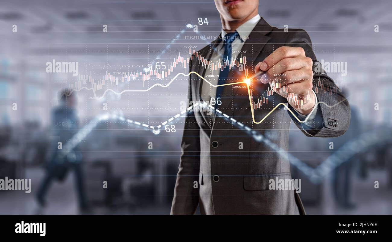 Business graph and trade monitor Stock Photo - Alamy