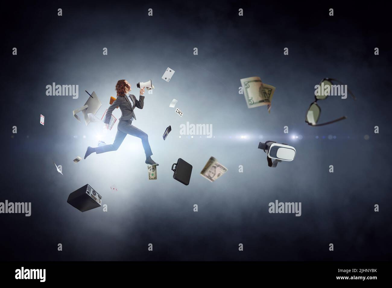 Conceptual image with business items flying in air Stock Photo - Alamy