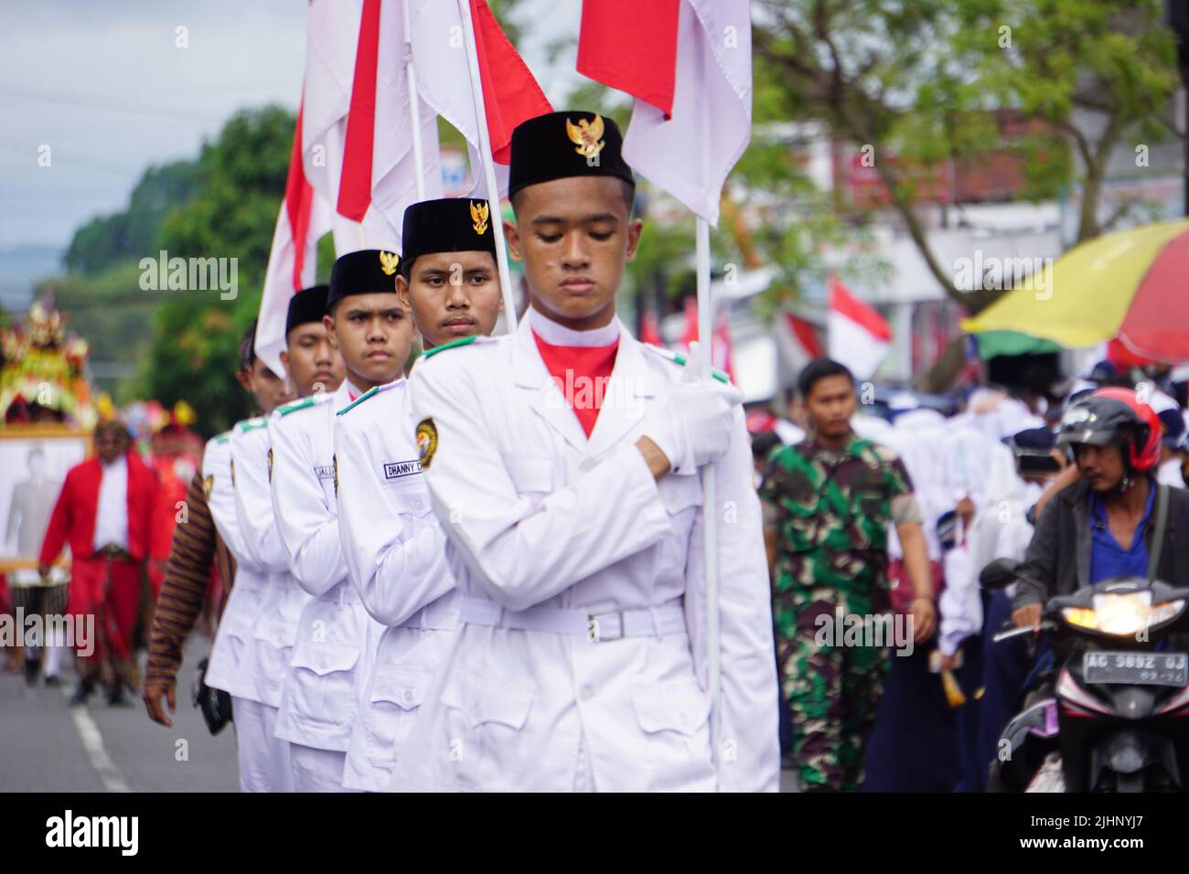 Paskibraka (Indonesian flag raiser) with national flag during grebeg ...