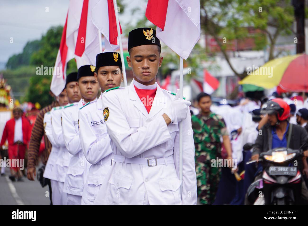 Paskibraka (Indonesian flag raiser) with national flag during grebeg ...