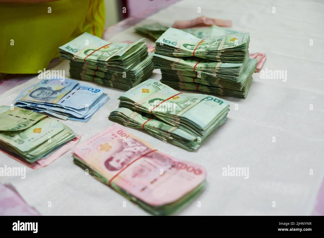 Money tied up hi-res stock photography and images - Alamy