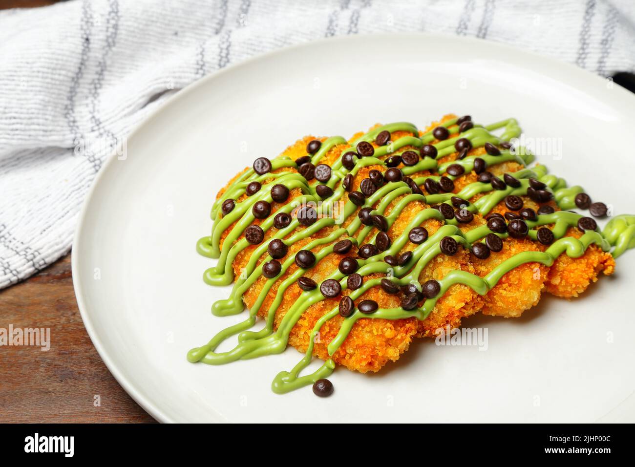 Fried Banana with various topping, chocochip, Matcha, and chocolate ...