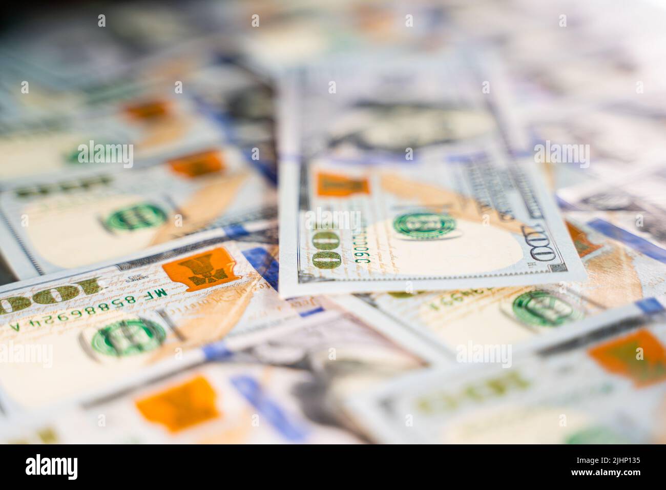 The number one hundred on a beautiful new one hundred dollar bill close ...