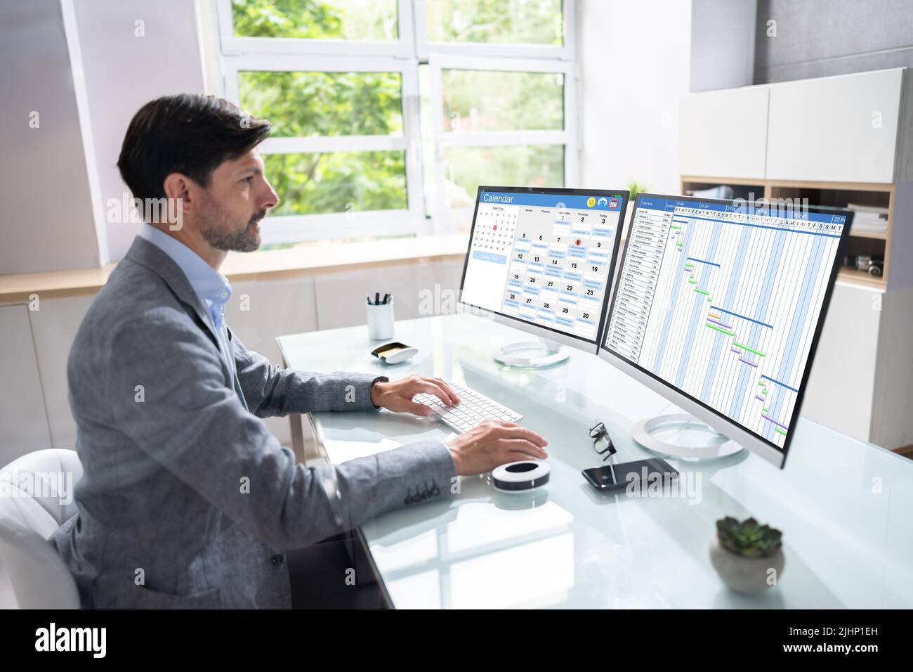 Gantt Chart Business Reports And Employee Job Schedule Stock Photo - Alamy
