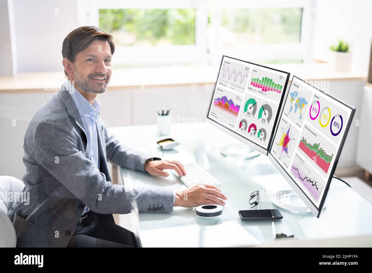 Analyst Man Looking At Business Data Analytics Dashboard Stock Photo ...