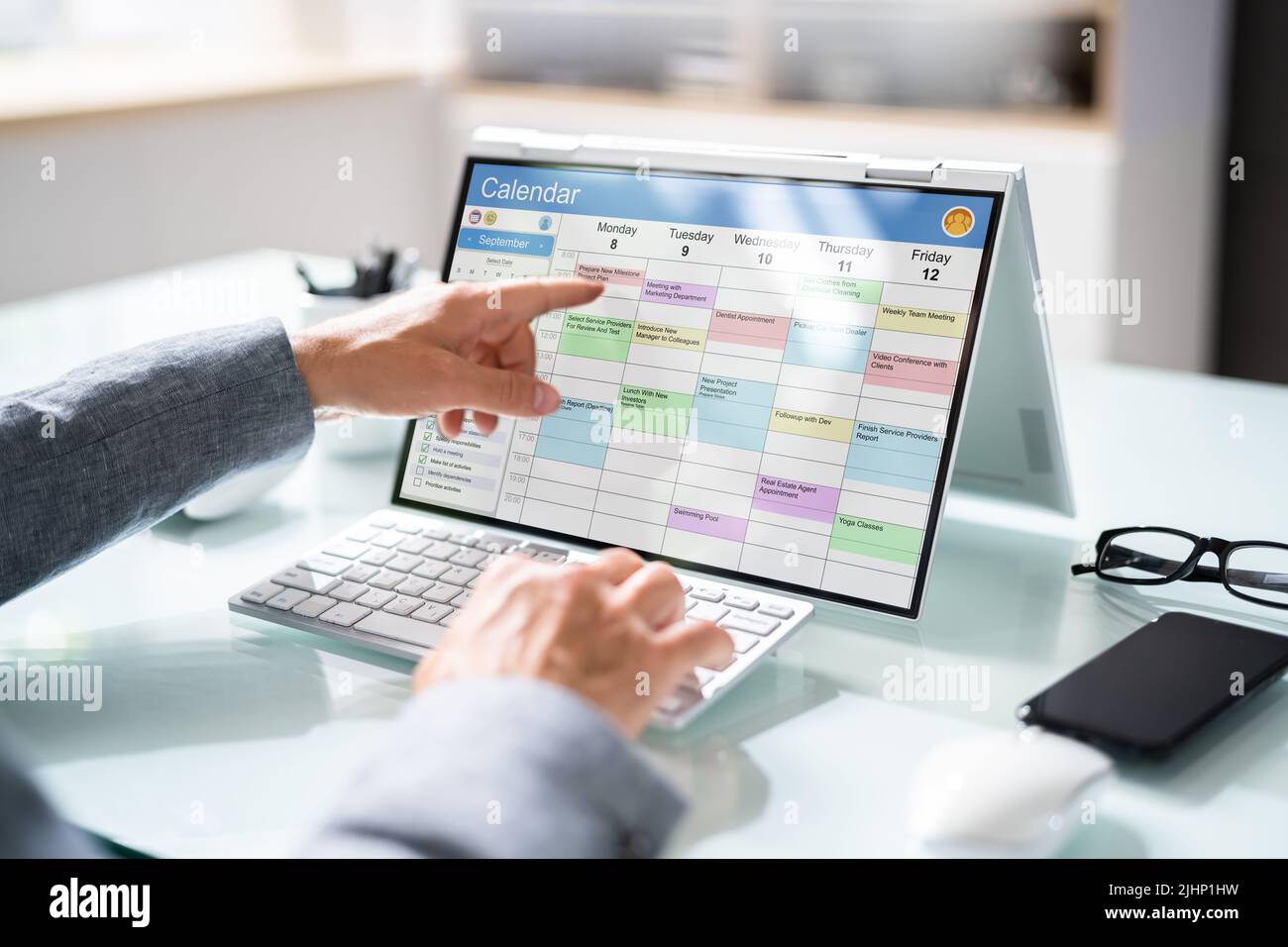 Appointment Schedule Planner And Date Calendar On Hybrid Laptop Stock ...