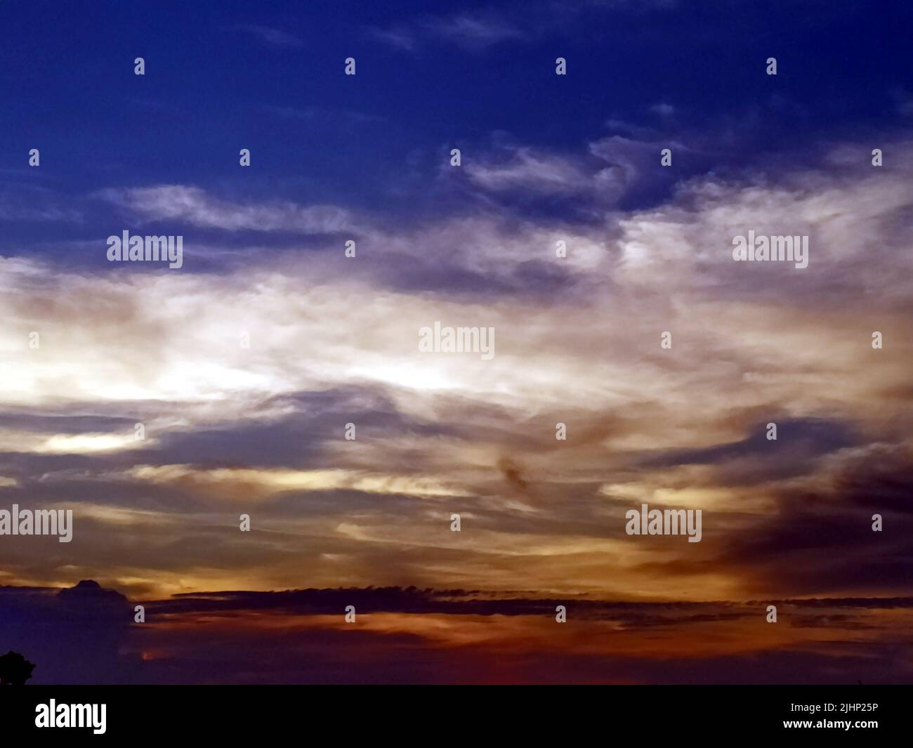 multi colore clouds in the blue sky Stock Photo - Alamy