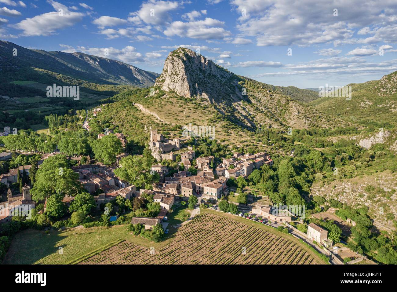 Aerial view of a medieval village, Saint-Jean-de-Bueges with vineyard ...
