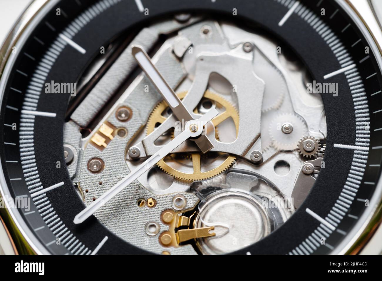 Swiss made quartz skeleton wrist watch, black deal and hands. Macro ...