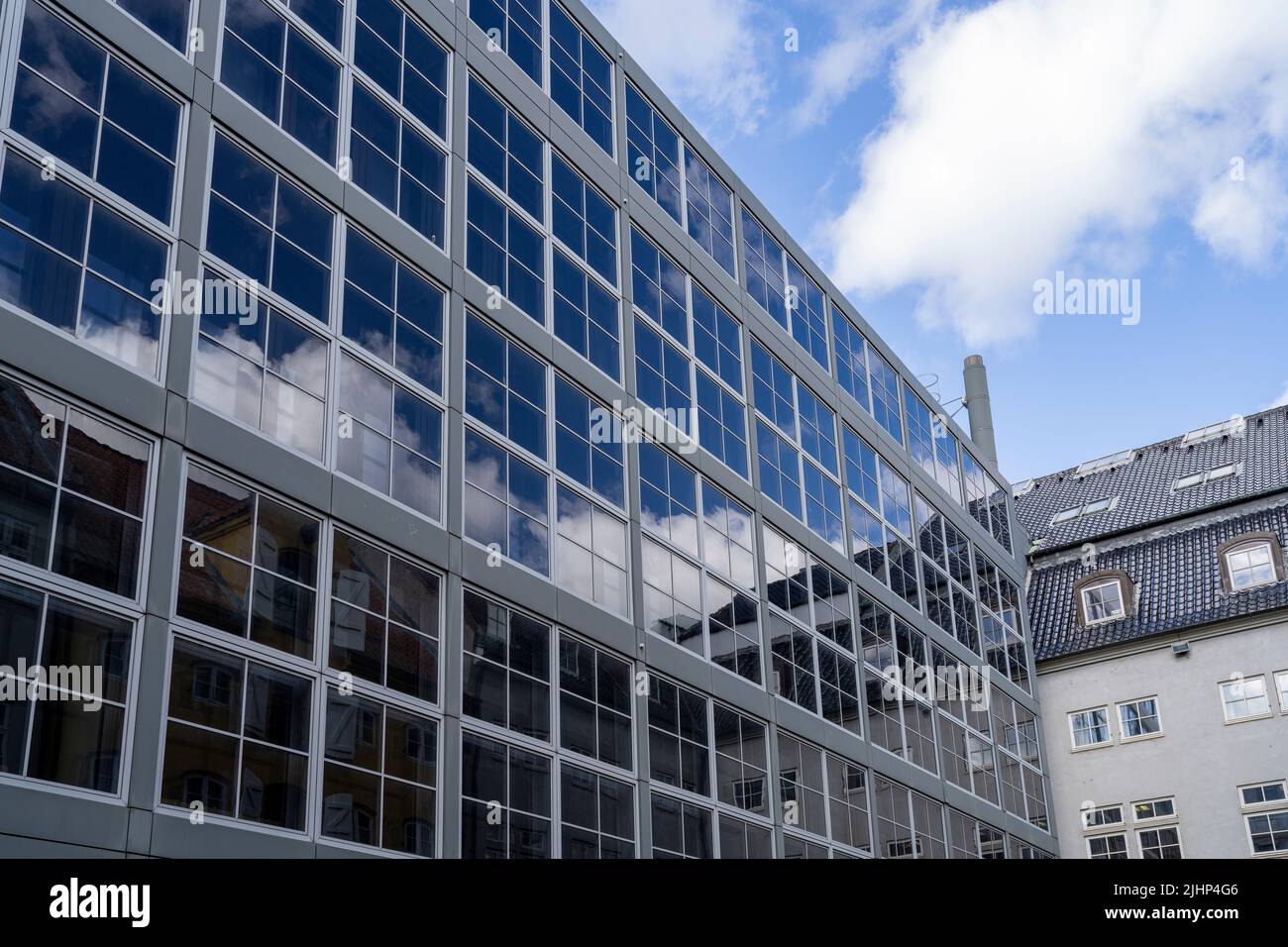Reflecting Window Glass on Modern building brick facade in Downtown ...