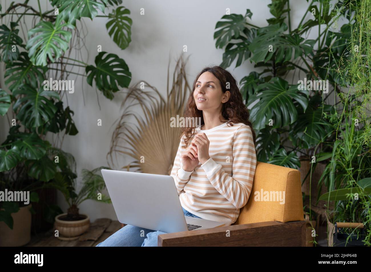 Flirting young woman communicate with boyfriend in online app on laptop ...
