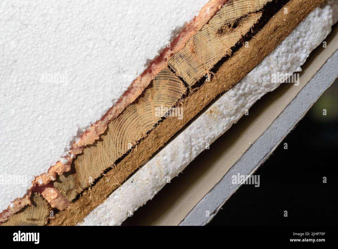 House insulation layers, styrofoam, polyurethane foam, wood, drywall ...