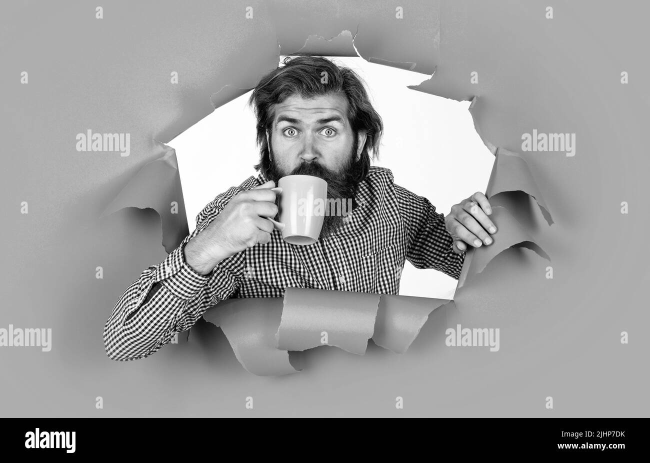 Bearded man drinking hot tea Black and White Stock Photos & Images - Alamy