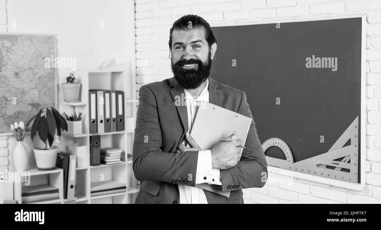 Going back to class. happy man with beard holding notebook. workbook ...