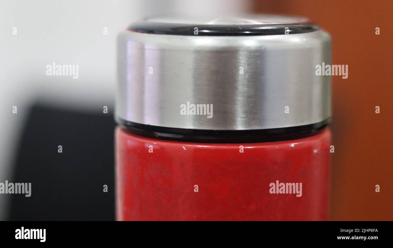 Stainless steel Red bottle Stock Photo - Alamy