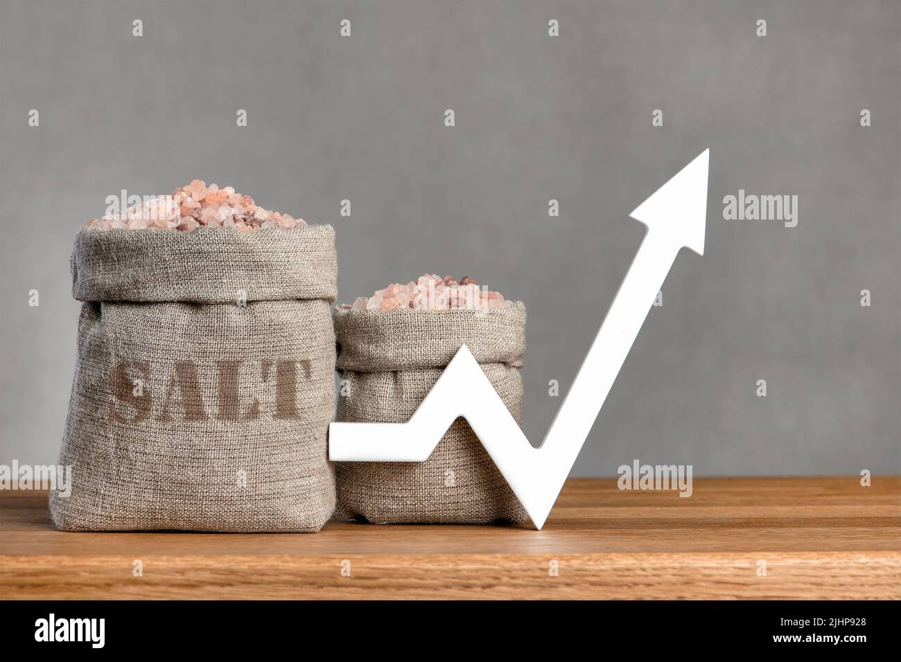 Salt price. Bag of salt and graph arrow pointing up, down. Rising salt ...
