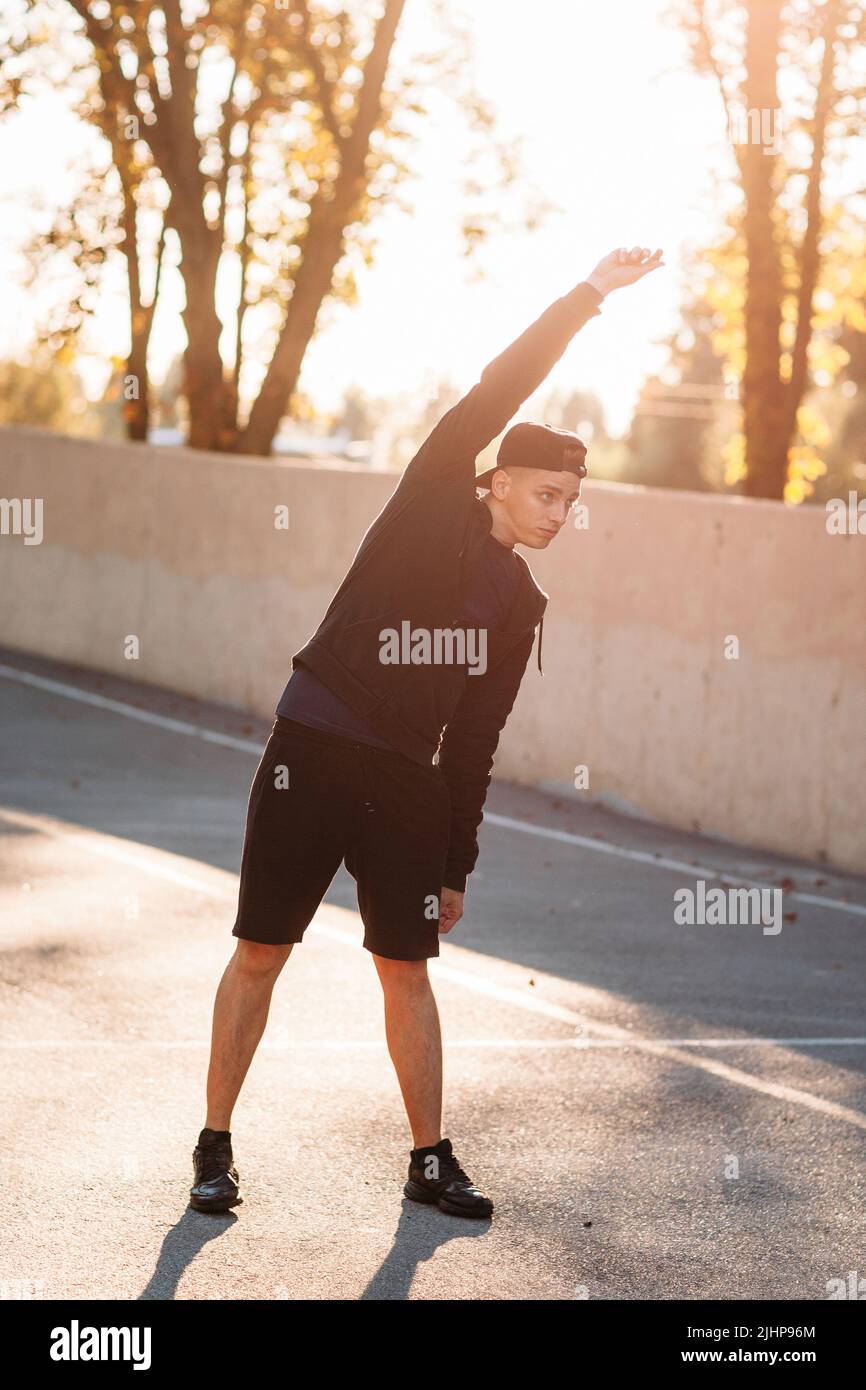 Sporty man stretching training on hi-res stock photography and images ...