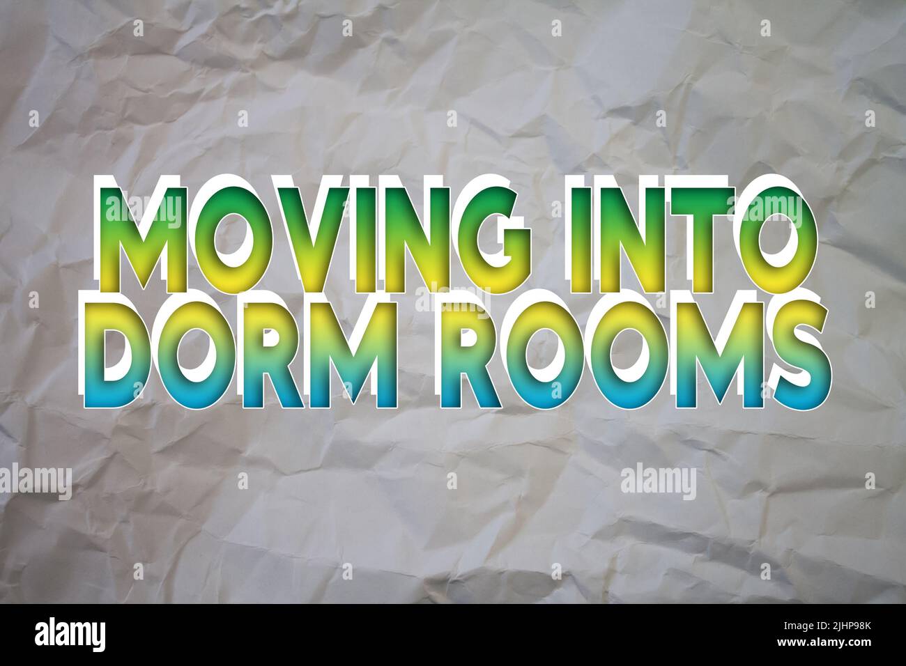 Moving Into Dorm Rooms text with Torn, Crumpled White Paper on colored ...