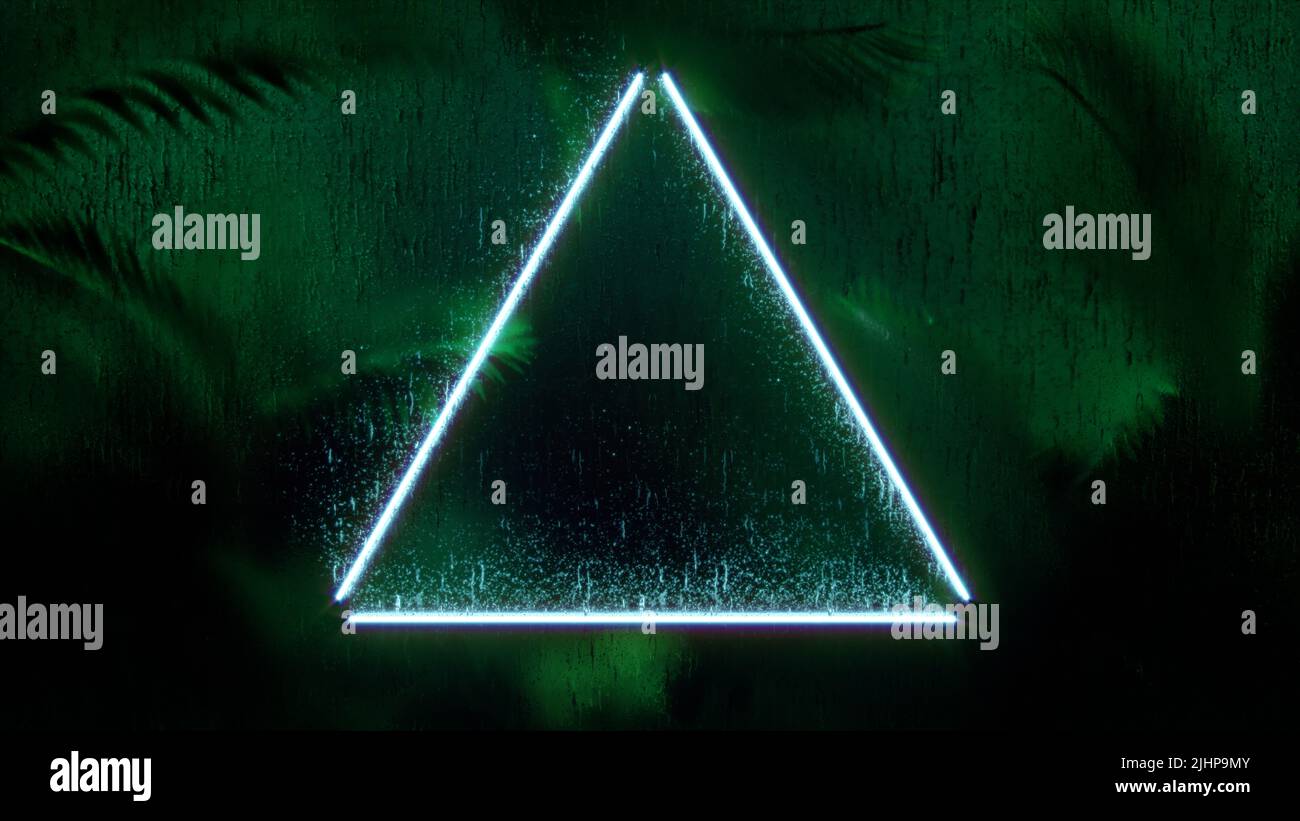 Blurred tropical leaves with triangle neon light frame behind Frosted ...