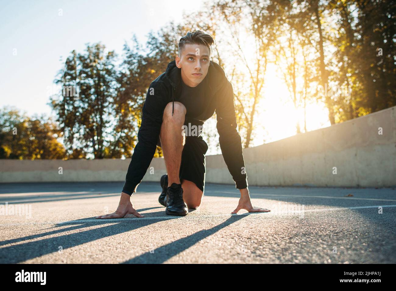 Crouching legs hi-res stock photography and images - Alamy