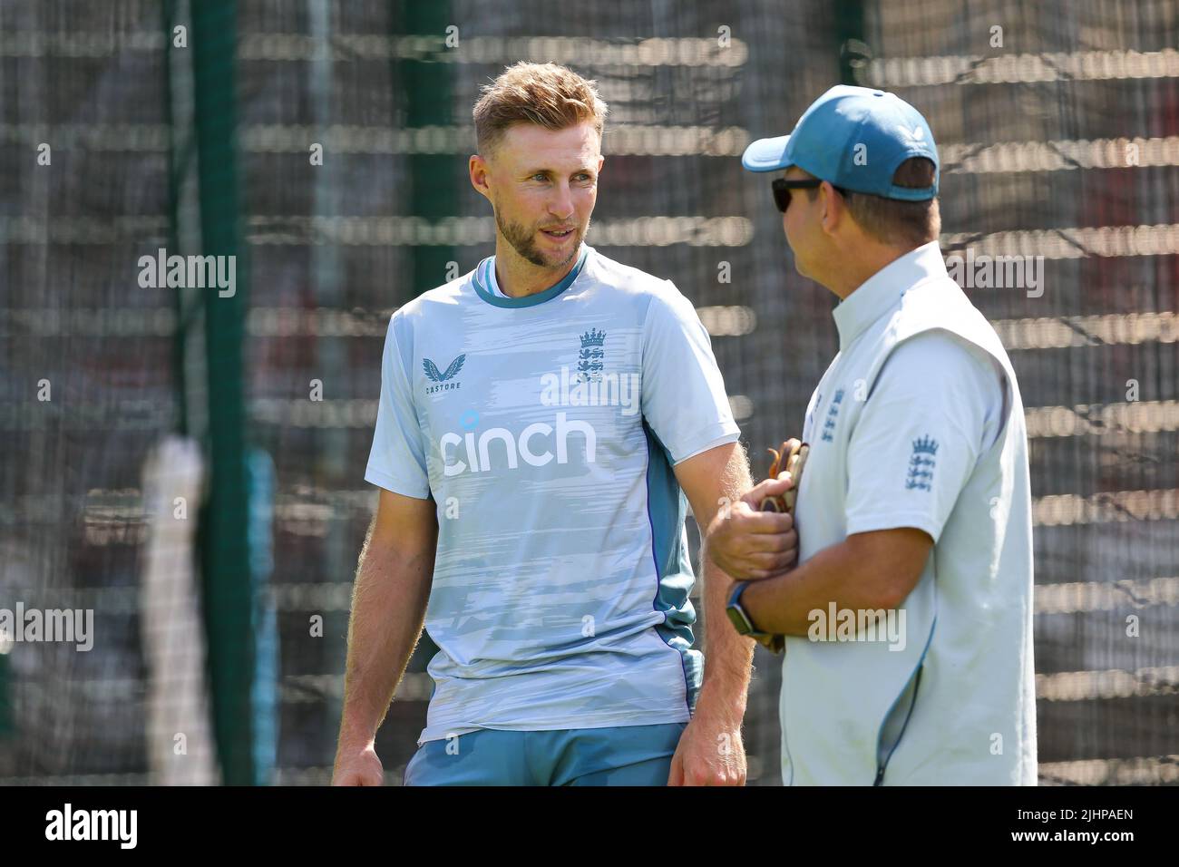 England's Joe Root chats with England coach Matthew Mott during a ...