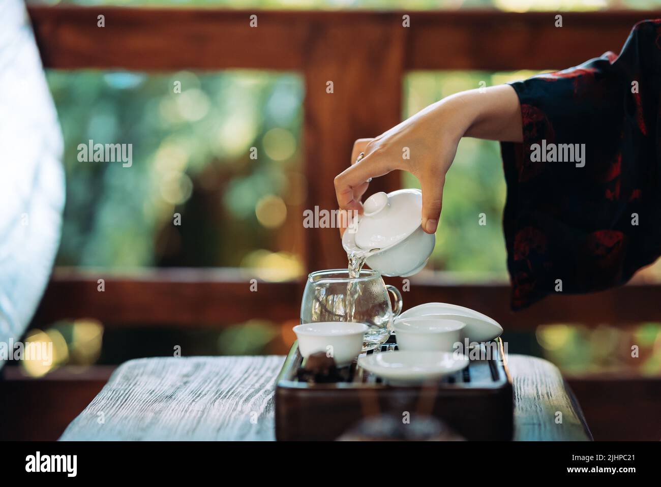 Process brewing tea woman hi-res stock photography and images - Alamy