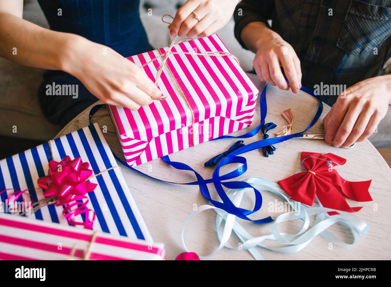 Gifts wrapping close-up. Self made presents Stock Photo - Alamy