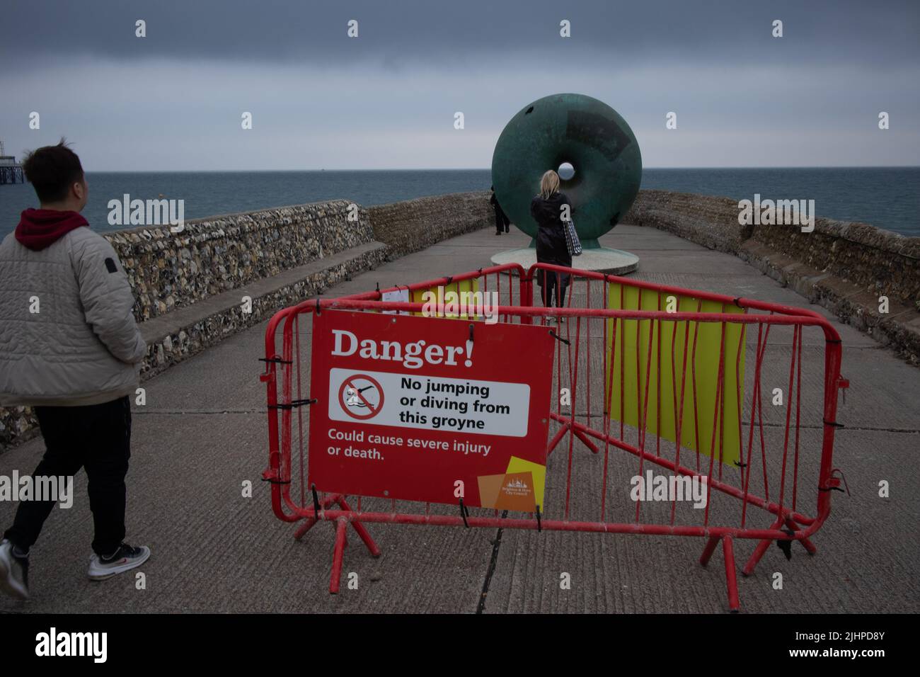 Danger warning sign at The Big Green Bagel, this unique statue was a ...
