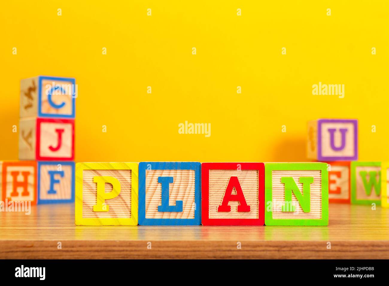Wooden alphabet blocks with letters Stock Photo - Alamy