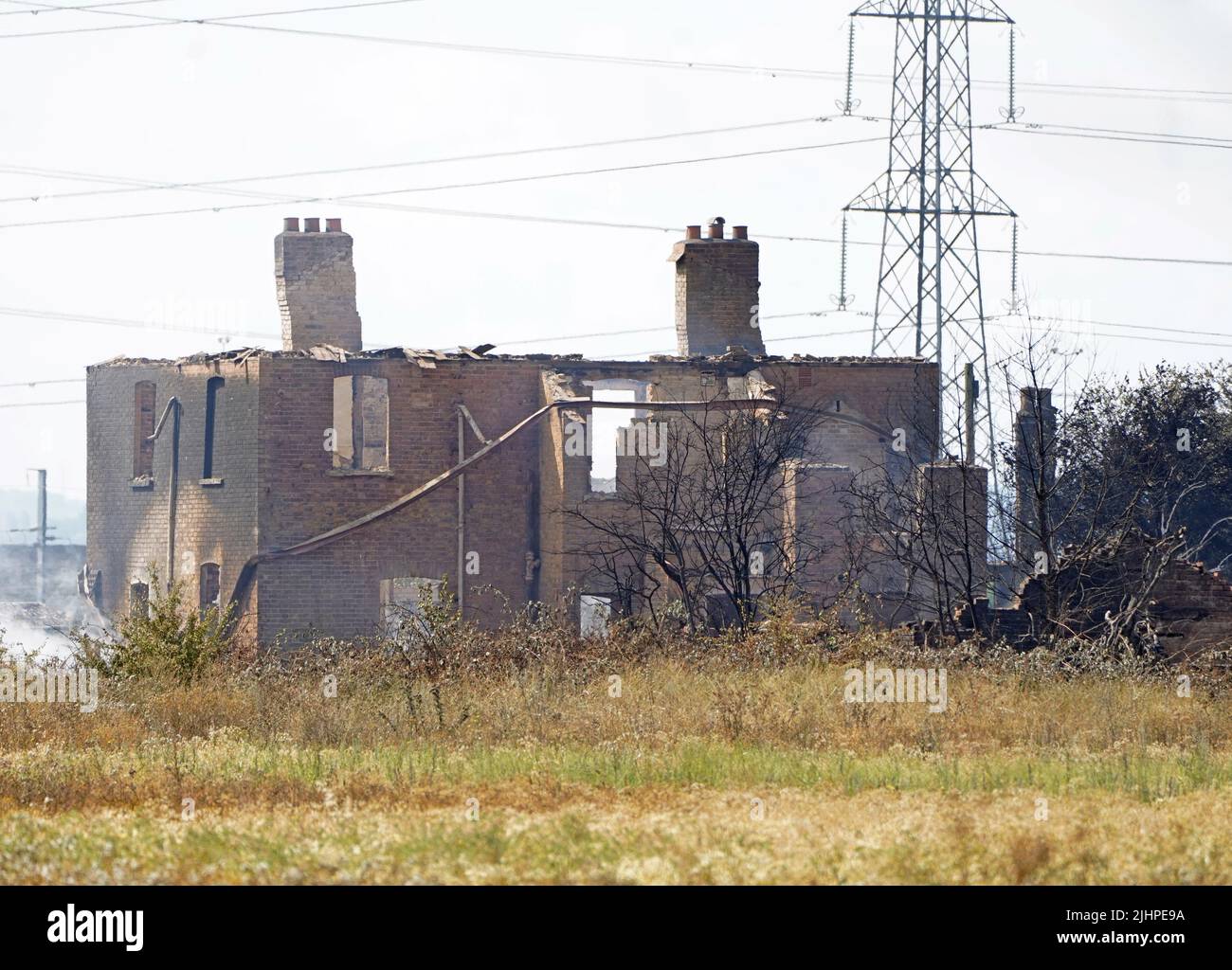 The scene after a blaze in the village of Wennington, east London after ...
