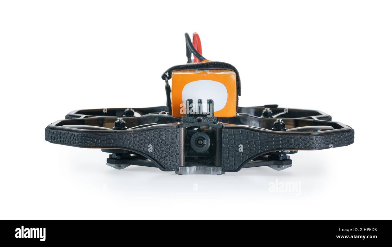 Black FPV cinewhoop drone with battery front view with selective focus ...