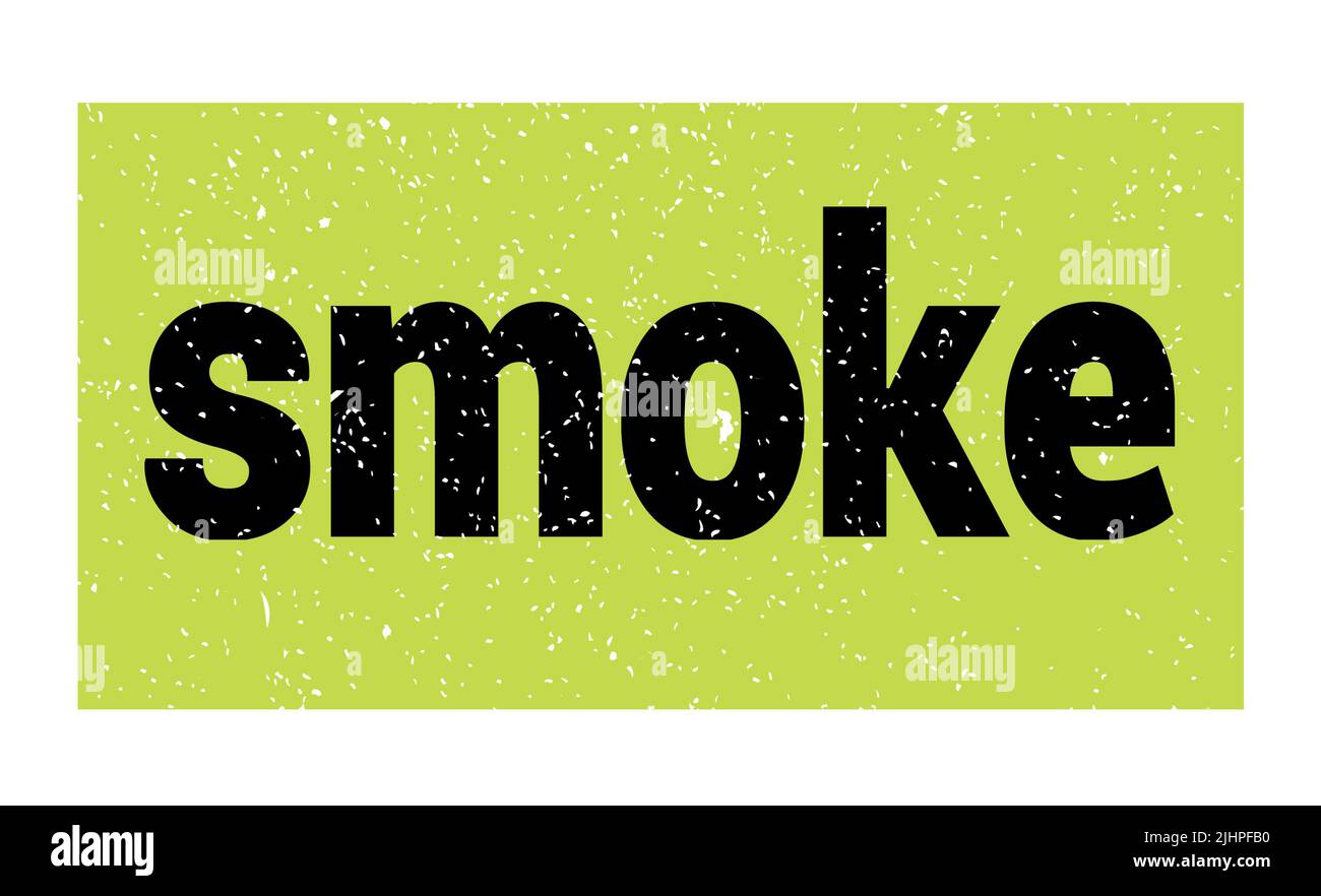 smoke text written on green-black grungy stamp sign Stock Photo - Alamy