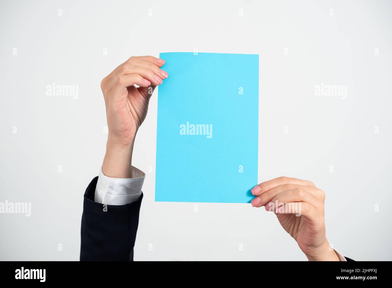 Businesswoman Holding Note With Important Message With Both Hands ...