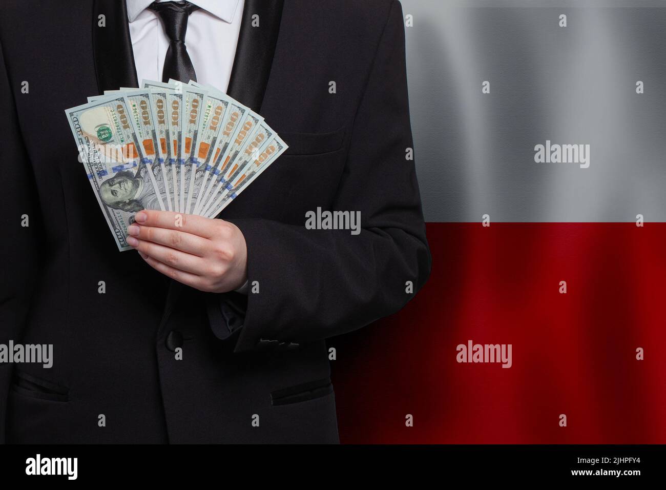 Polish business man with 100 US dollar bills money banknotes against ...