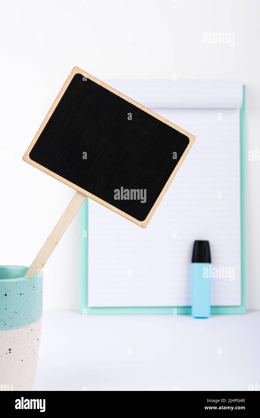 Small Blackboard With Important Message In Cup On Desk With Clipboard ...