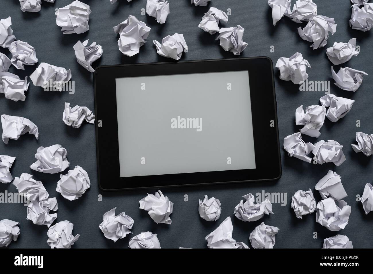 Tablet Screen With Important Message On It Surrounded With Paper Wraps ...