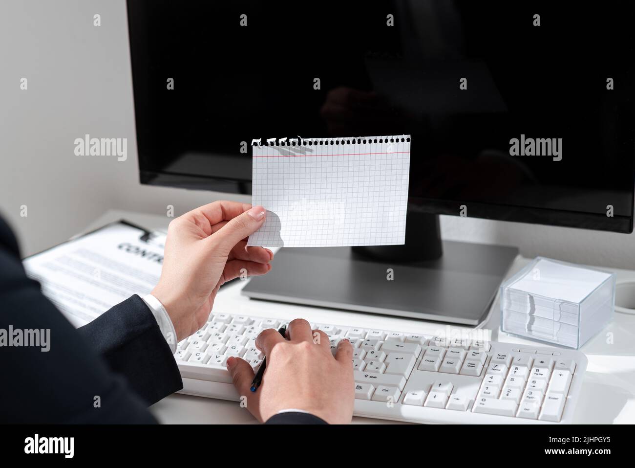 Businesswoman Holding Pen And Important Message Wtitten On Paper On ...