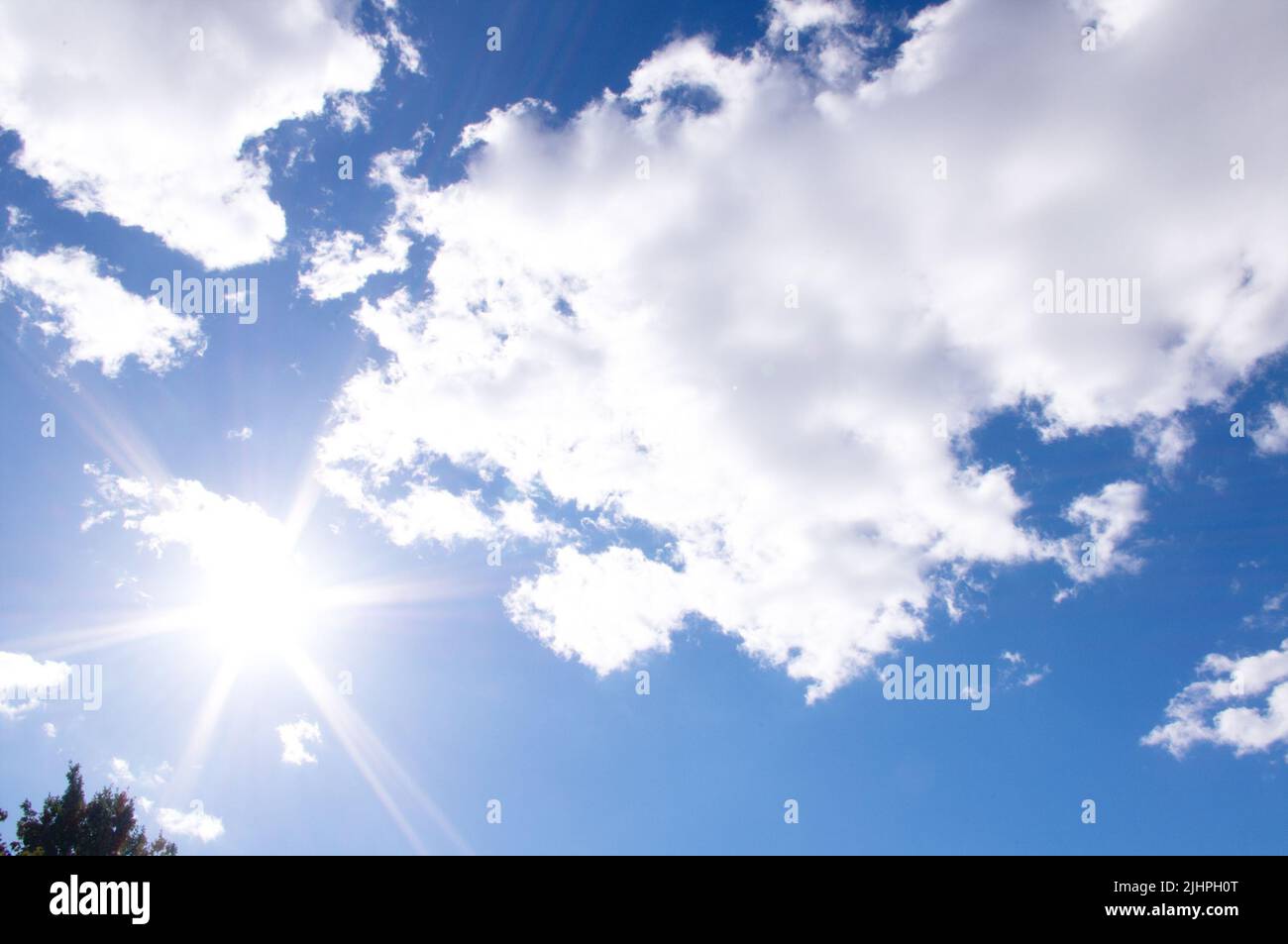 Bright sun and blue sky with clouds. Concept of abnormal heat Stock ...
