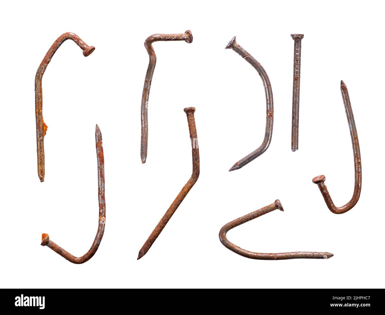 Curved rusty nails isolated on white background Stock Photo - Alamy