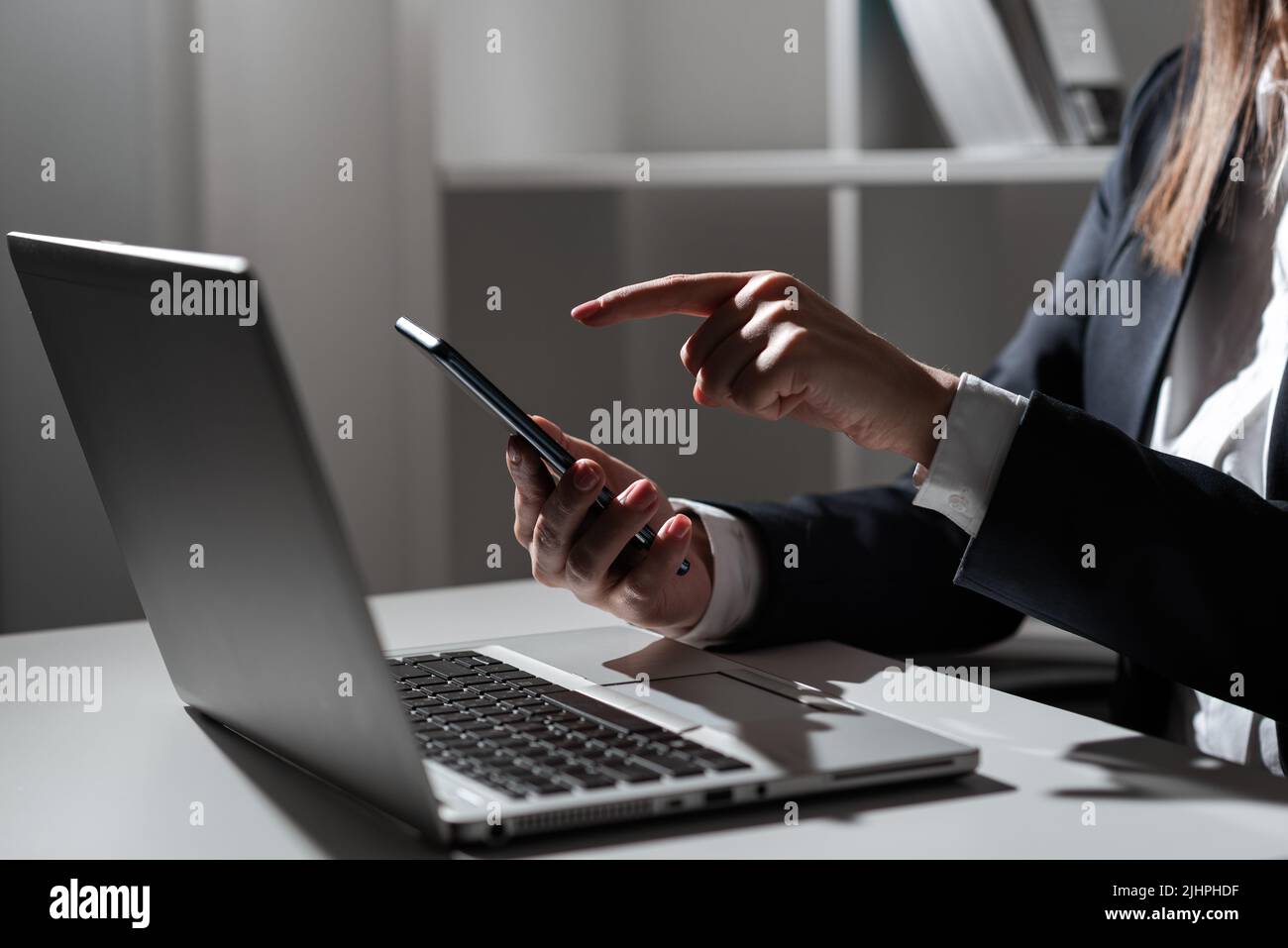 Businesswoman Holding Tablet In One Hand And Pointing On Important News ...